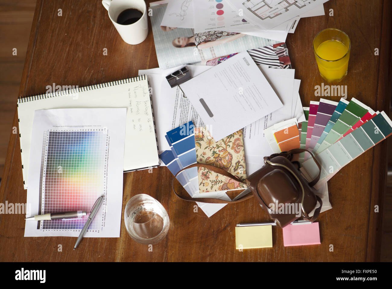 Cluttered work space Stock Photo - Alamy