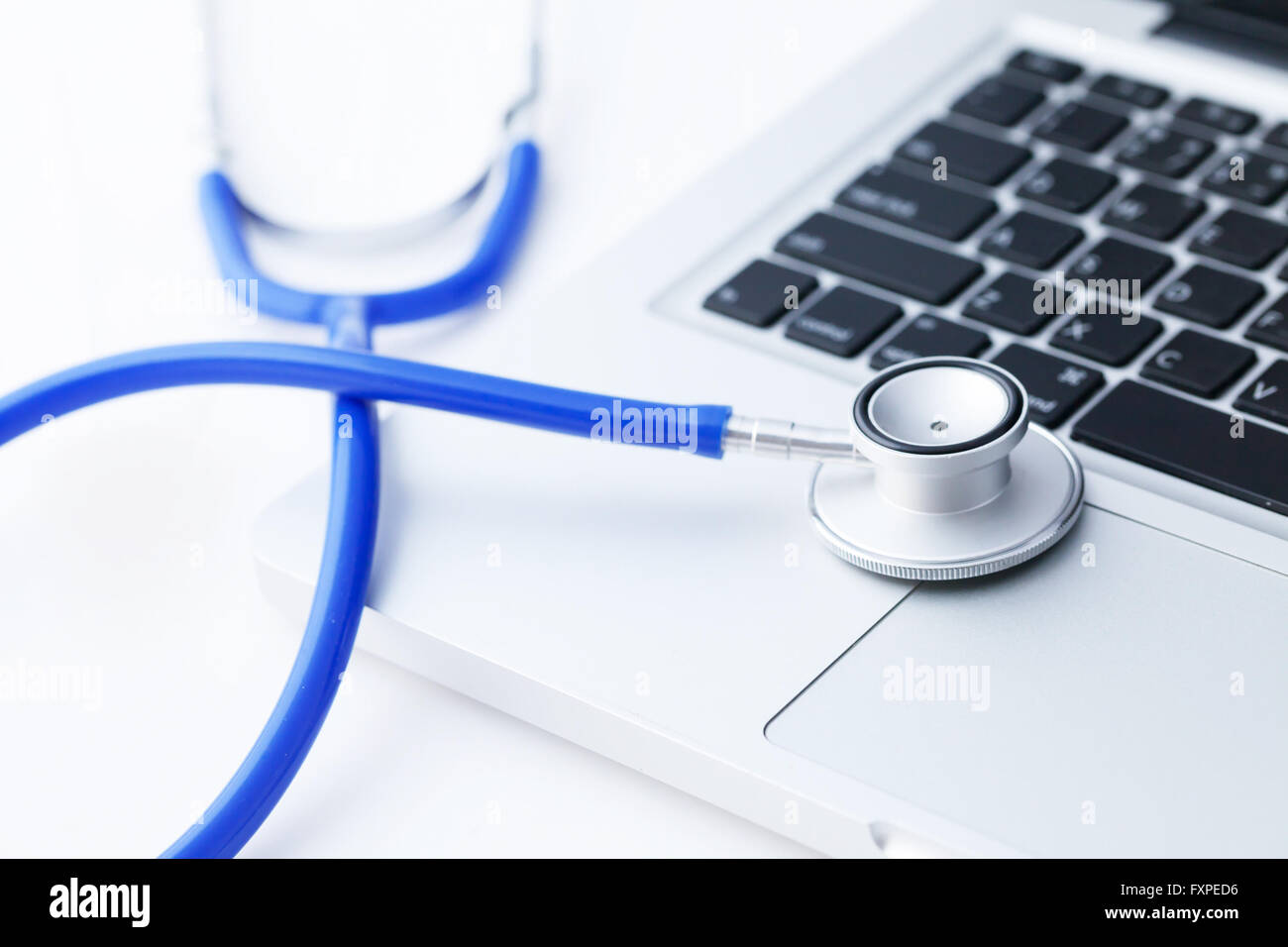 Stethoscope on laptop - Computer repair and maintenance concept Stock ...
