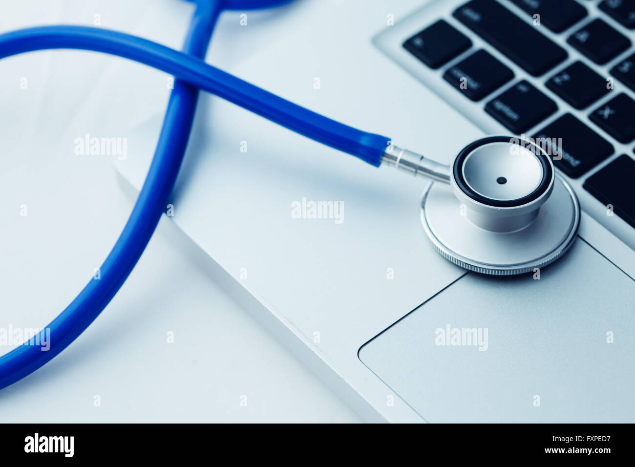 Stethoscope on laptop - Computer repair and maintenance concept - in ...