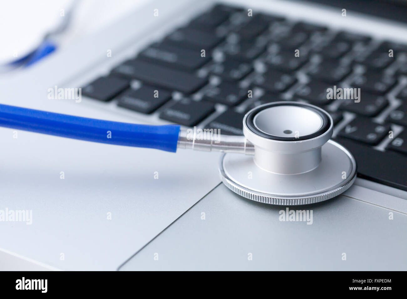 Stethoscope on laptop - Computer repair and maintenance concept Stock ...