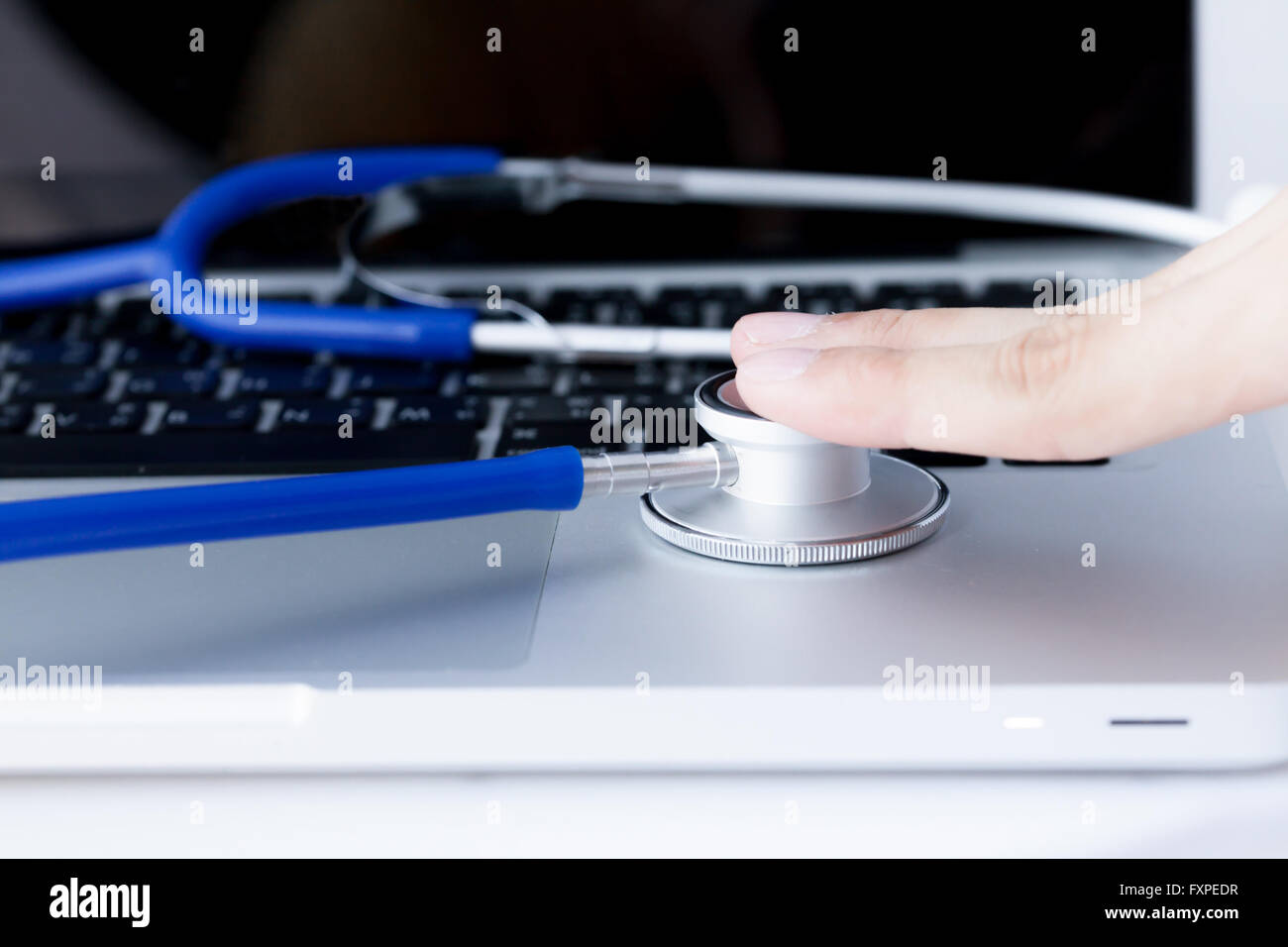 Stethoscope on laptop - Computer repair and maintenance concept Stock ...