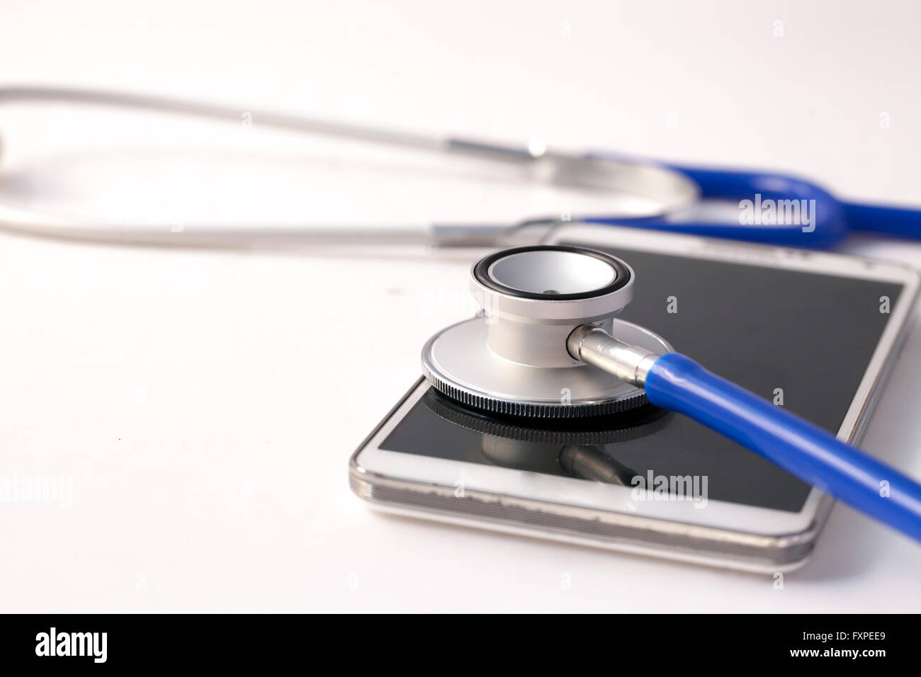 Smartphone being diagnosed by stethoscope - phone repair and check up ...