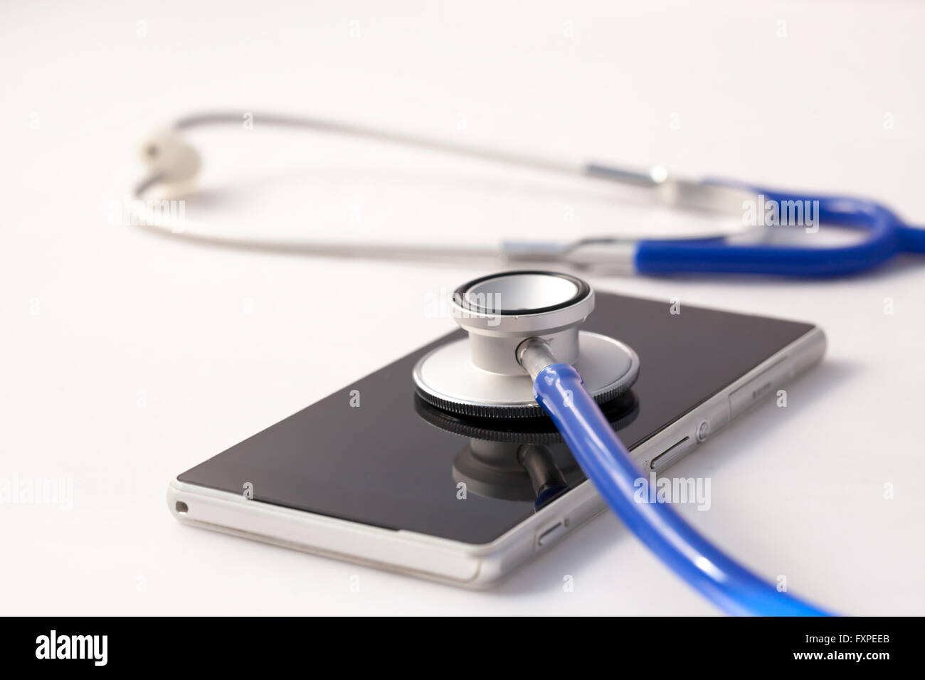 Smartphone being diagnosed by stethoscope - phone repair and check up ...