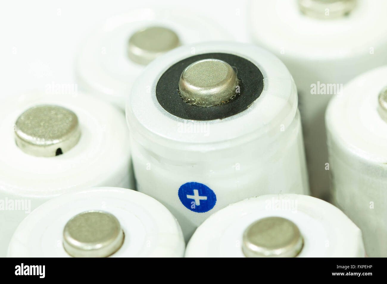 Pile of batteries stacked in a row together Stock Photo - Alamy