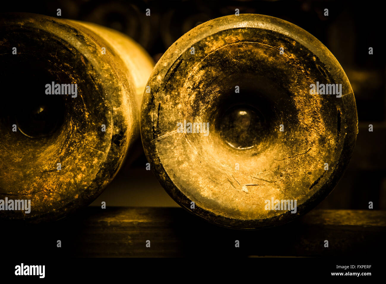 Indented bottom of wine bottles Stock Photo - Alamy