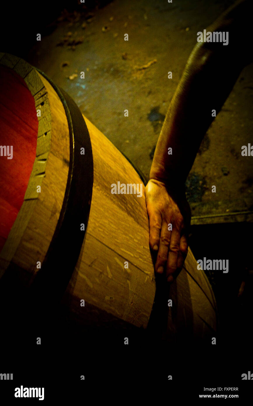 Hand touching wooden cask Stock Photo - Alamy