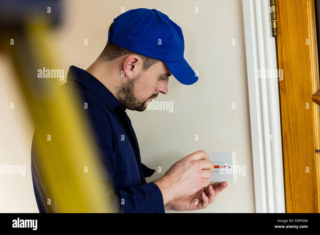 Fixing a door hi-res stock photography and images - Alamy