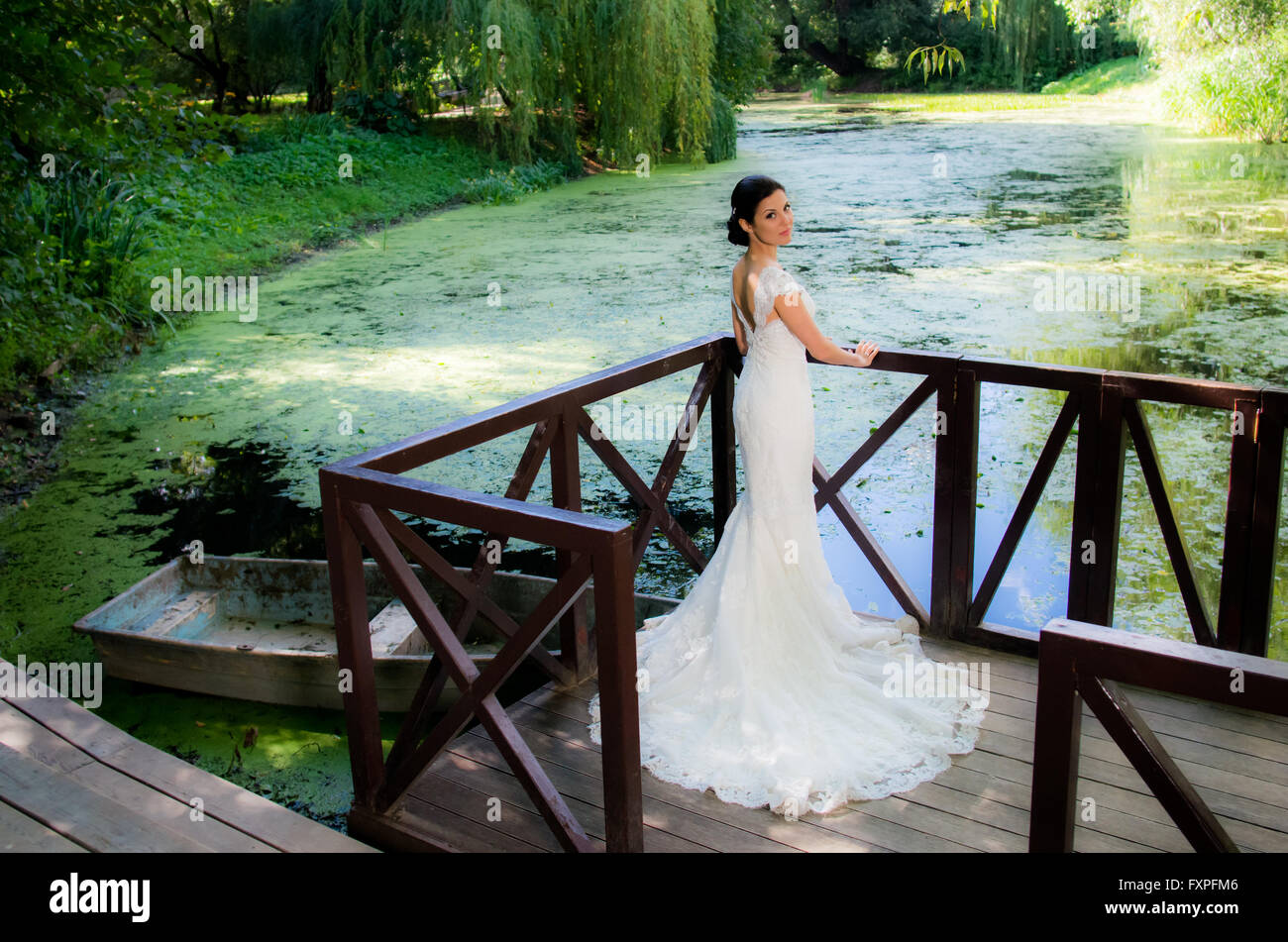Posing near pond hi-res stock photography and images - Alamy