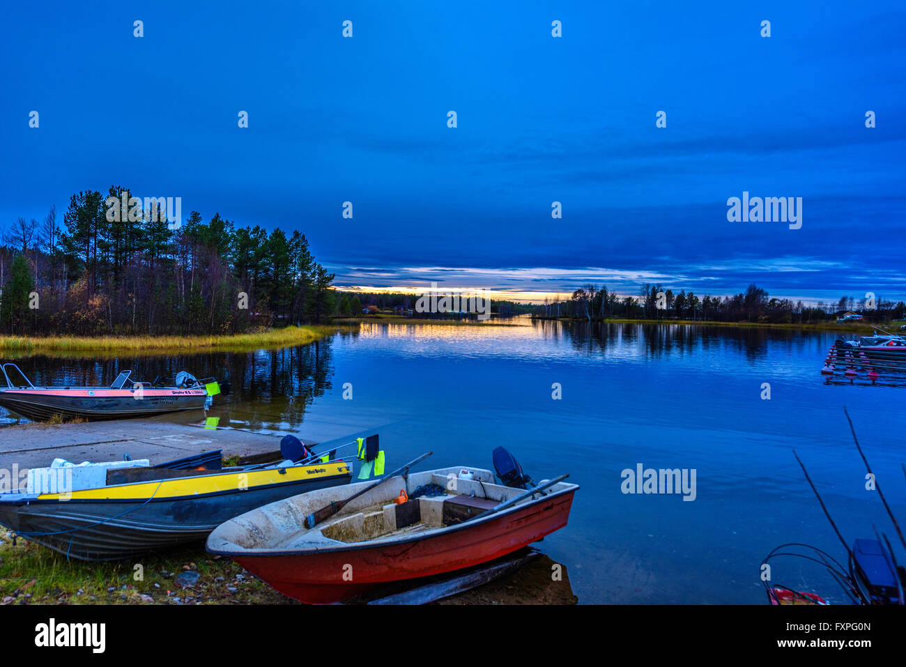 Sunset across Lake Inari at Nellim Stock Photo - Alamy