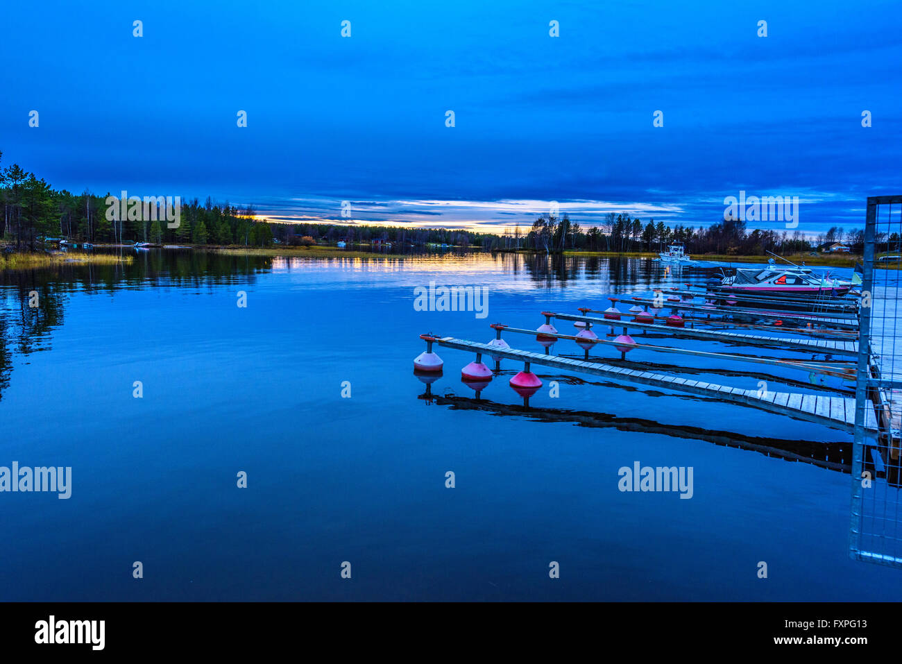 Sunset across Lake Inari at Nellim Stock Photo - Alamy