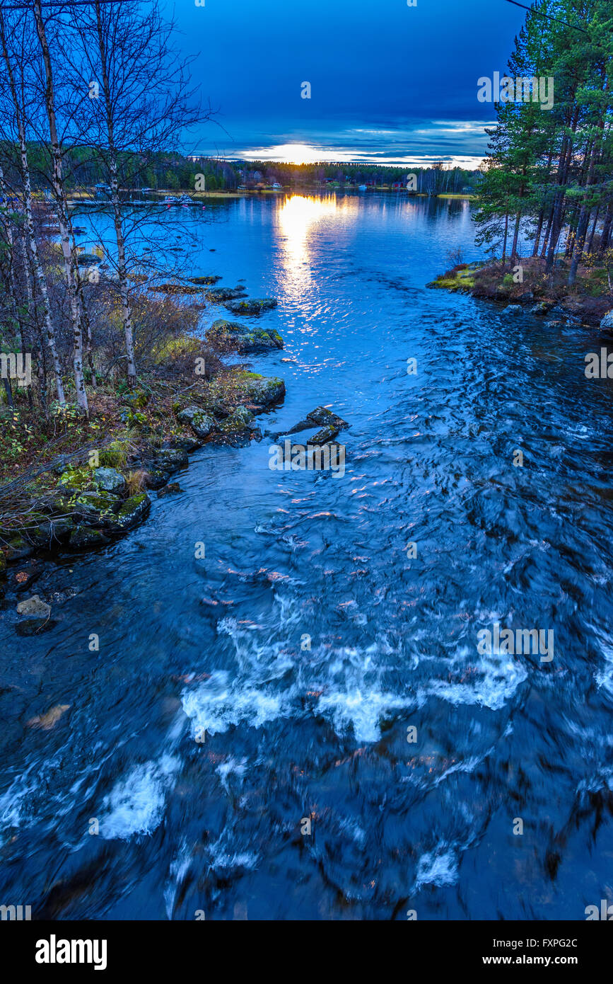 Sunset across Lake Inari at Nellim Stock Photo - Alamy