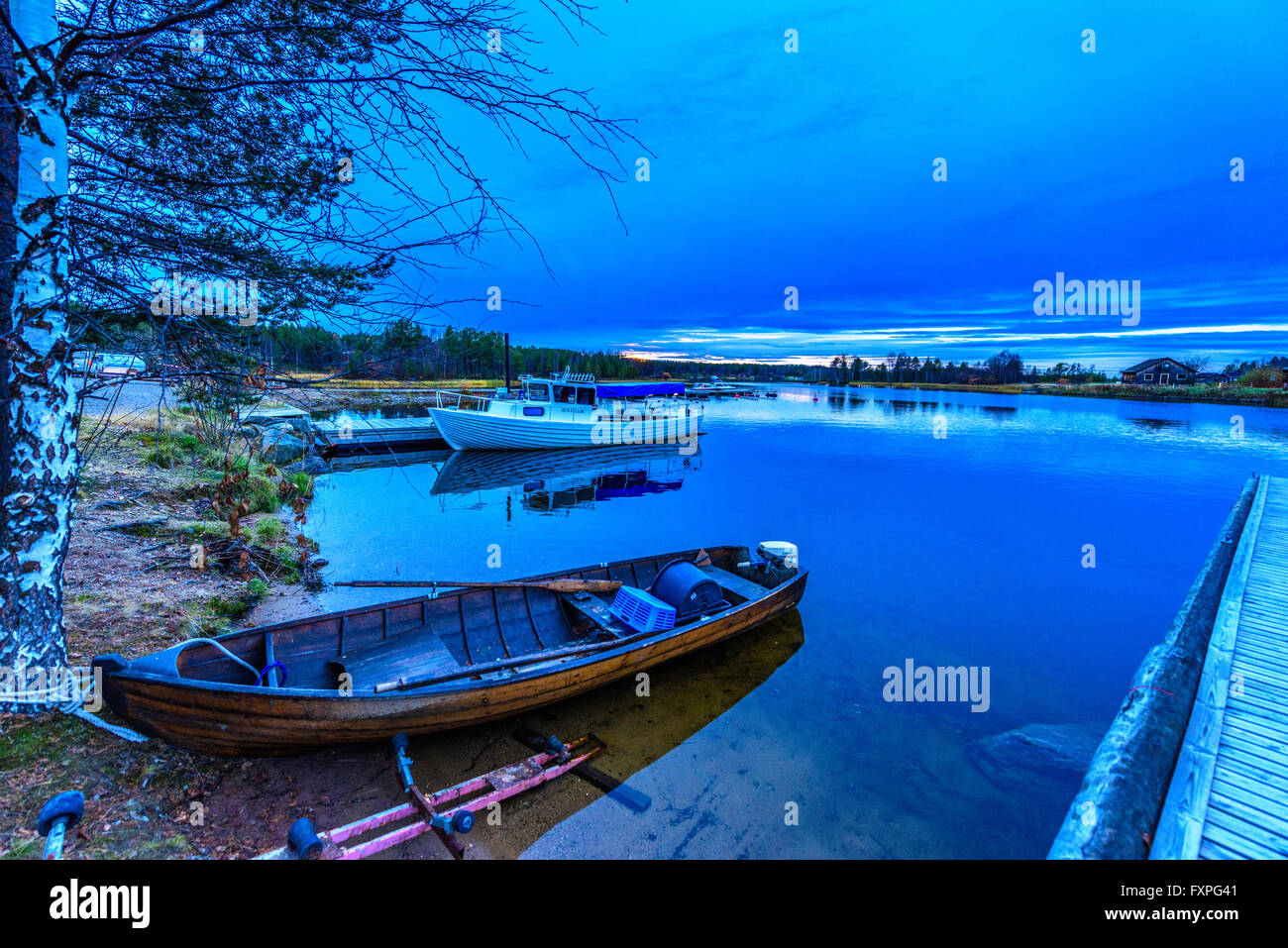 Sunset across Lake Inari at Nellim Stock Photo - Alamy