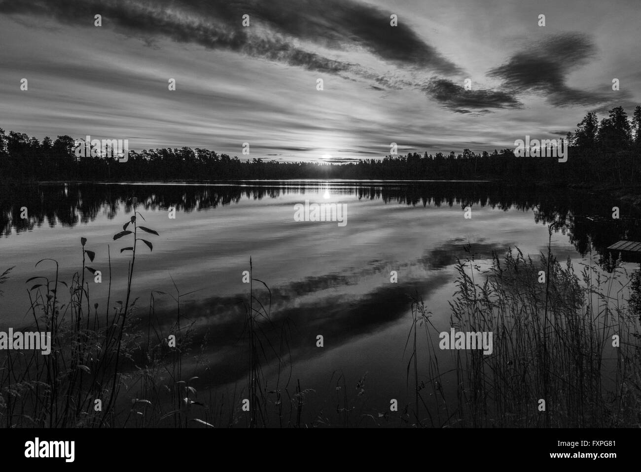 Sunrise on the lake at Nellim Wilderness Hotel Stock Photo - Alamy