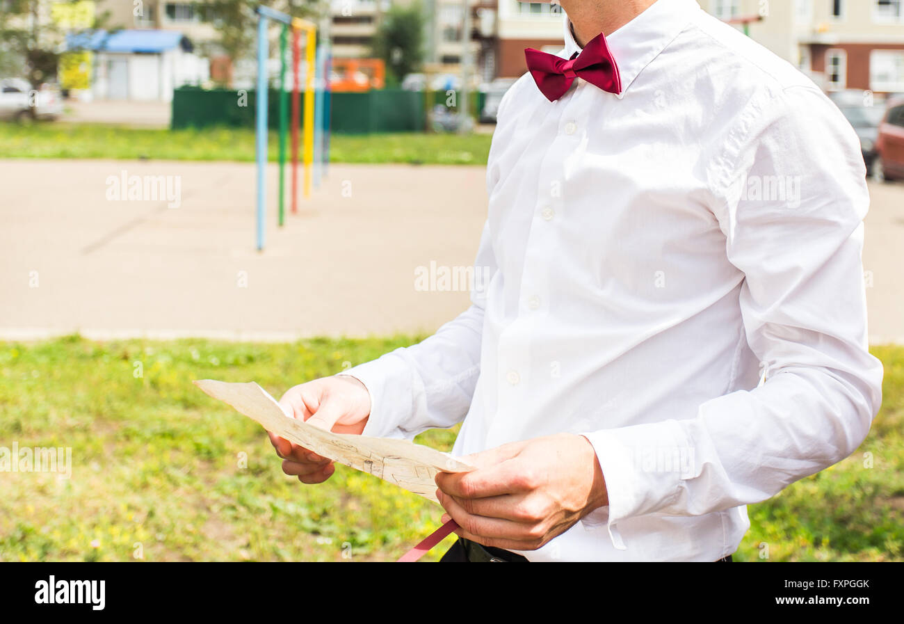 Man looking at city map on a trip. Looking for directions Stock Photo ...
