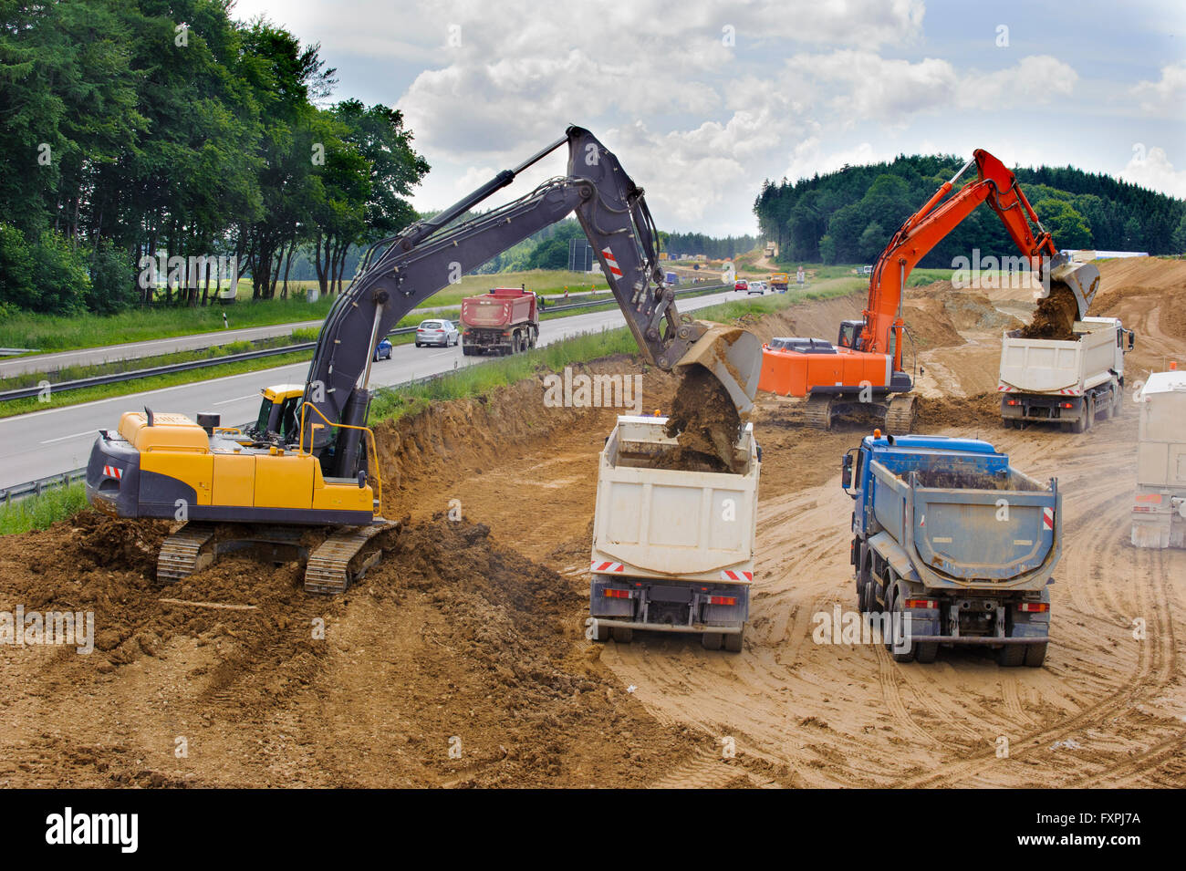 german highway under construction with trucks and digger Stock Photo ...