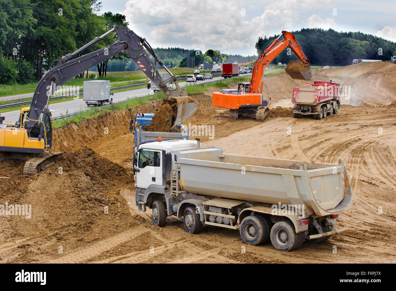 german highway under construction with trucks and digger Stock Photo ...