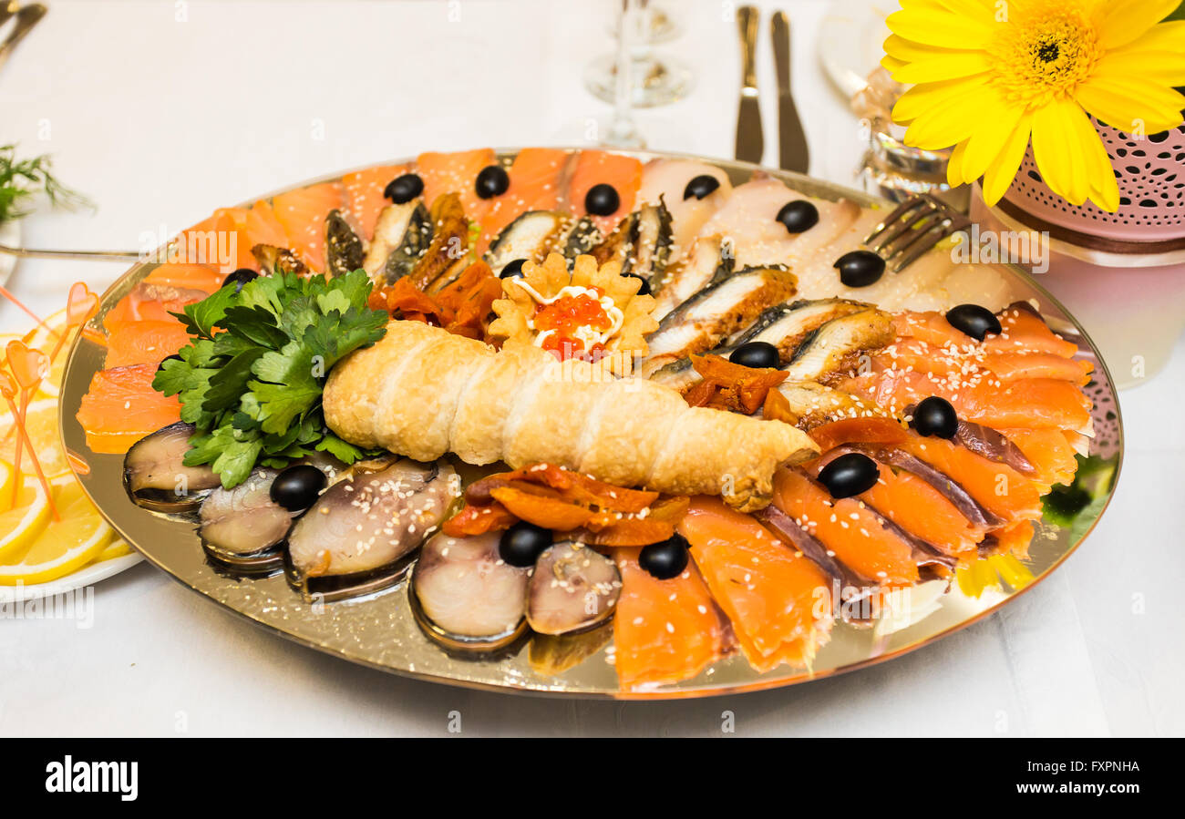 Assorted fish on a plate Stock Photo - Alamy