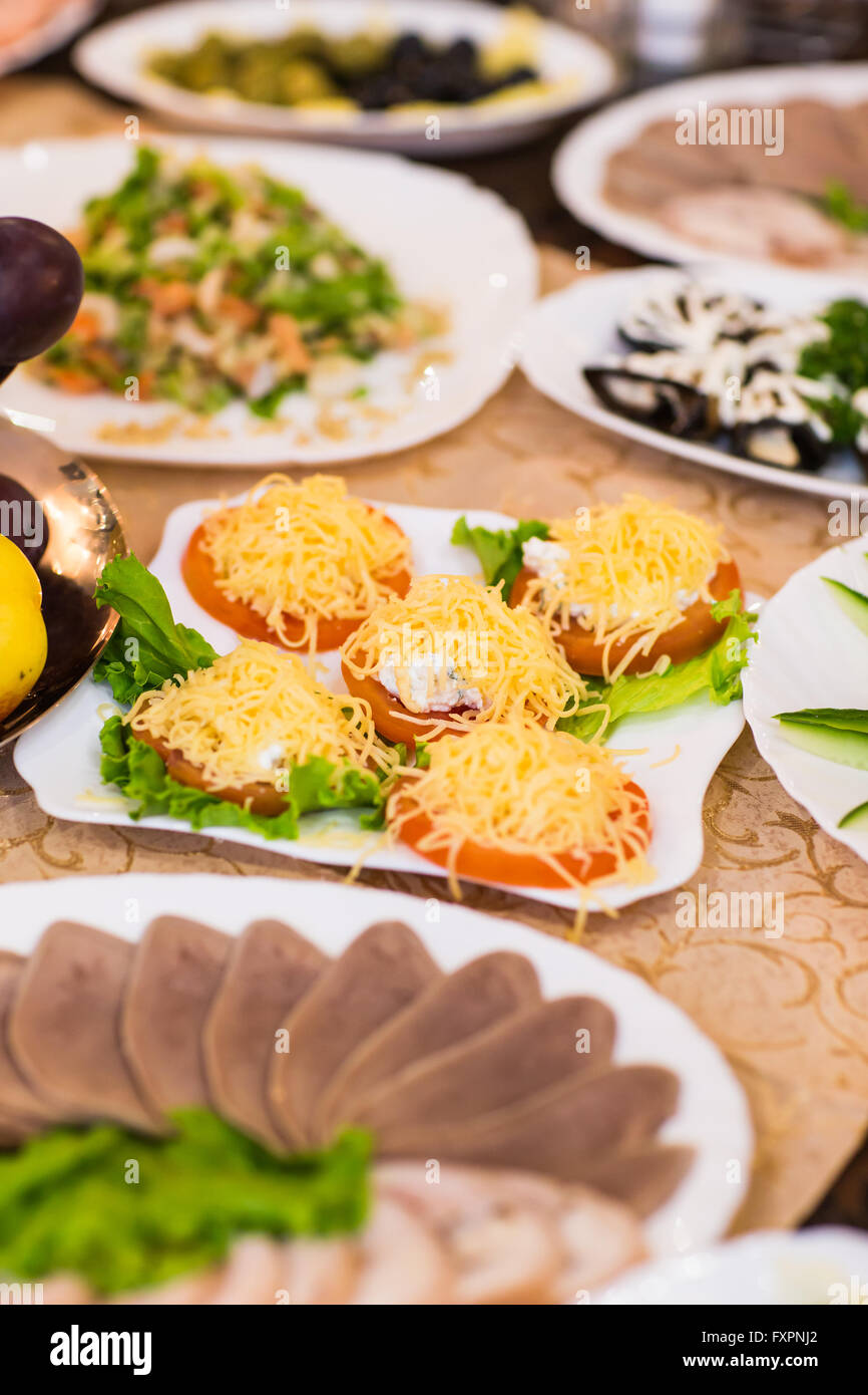 Assortment festive appetizers on the table Stock Photo - Alamy