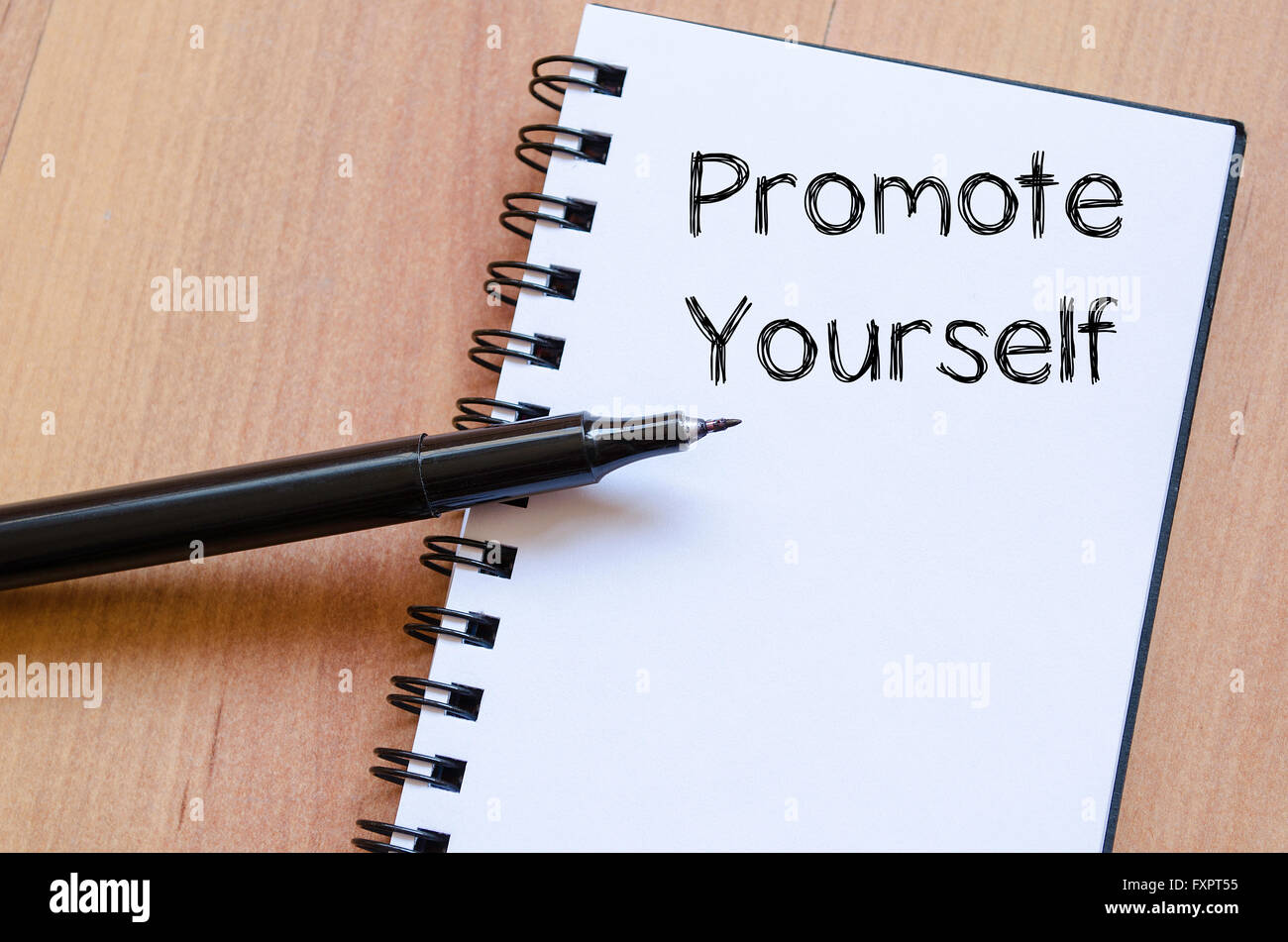 Promote yourself text concept write on notebook Stock Photo - Alamy