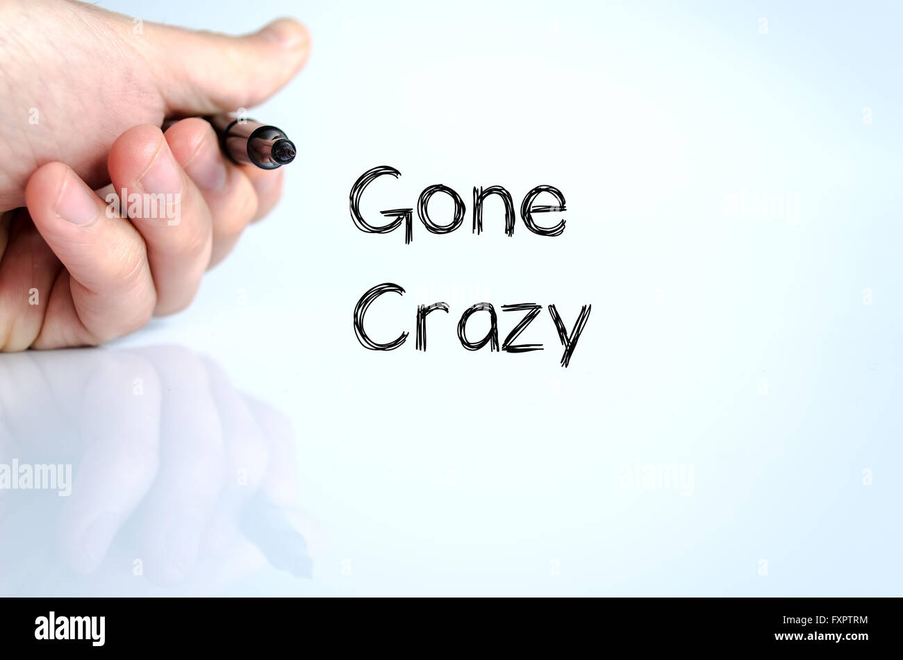 Gone crazy note in business man hand Stock Photo - Alamy