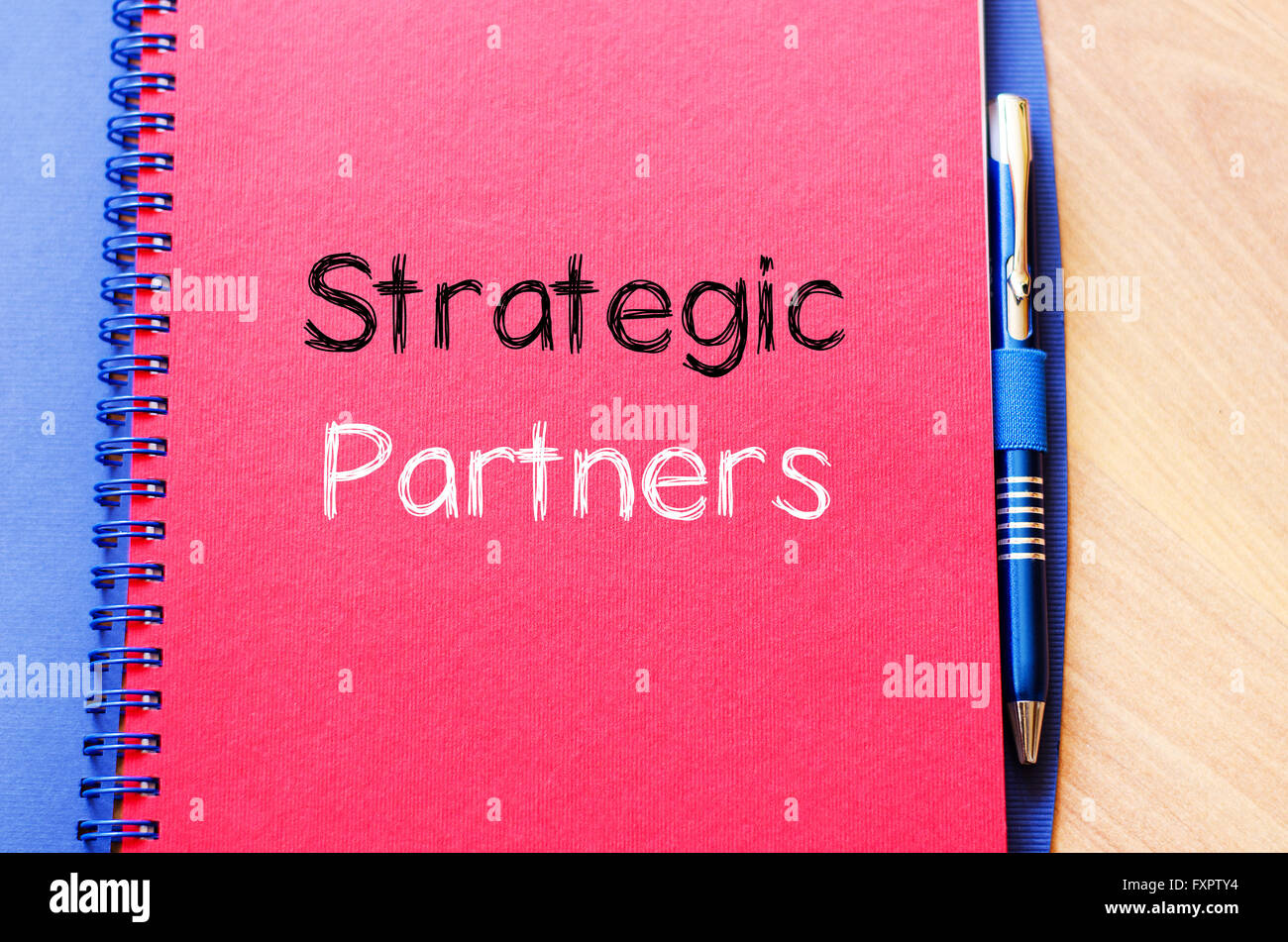 Strategic partners text concept write on notebook Stock Photo - Alamy