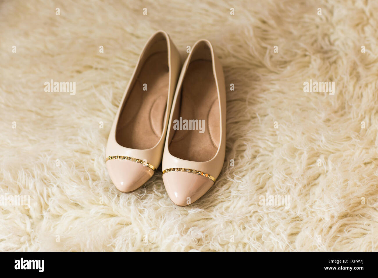 Beige female shoes. top view Stock Photo - Alamy