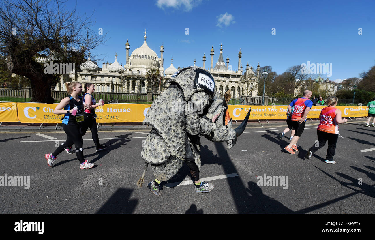 Brighton UK 17th April 2016 - A runner dressed as a Rhino passes by the ...