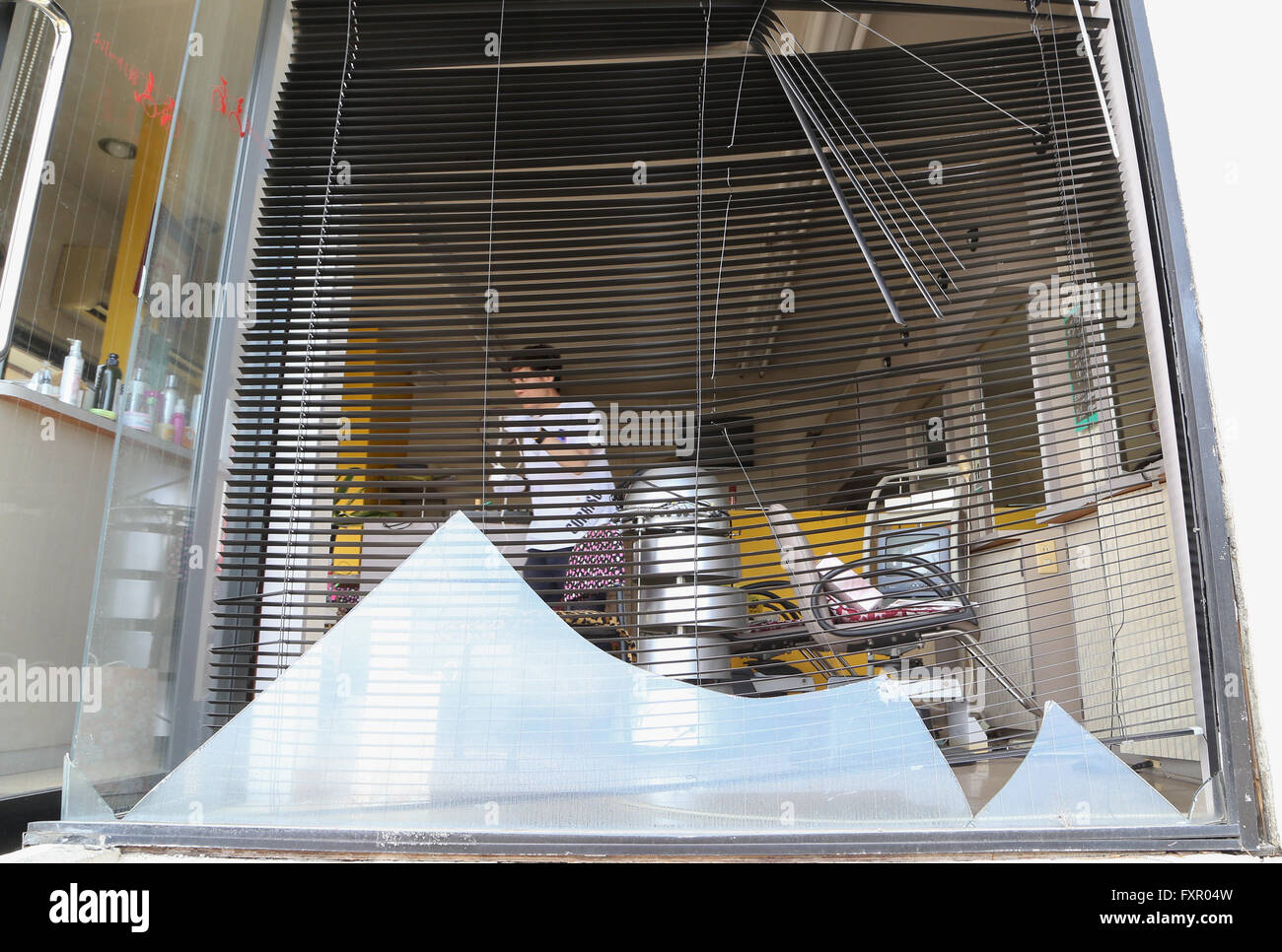 Kumamoto, Japan - April 15 : A big window at a beauty salon was broken ...