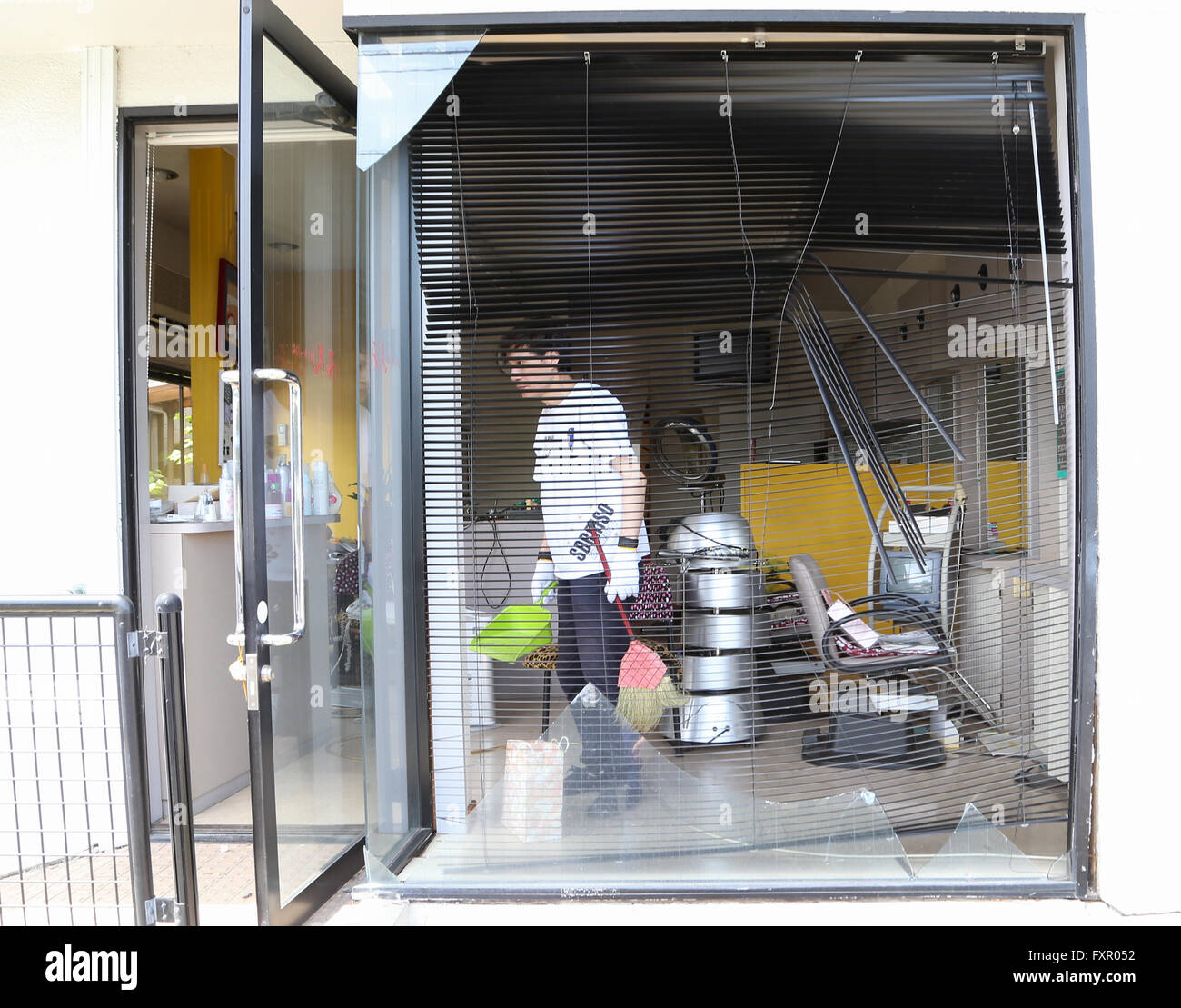 Kumamoto, Japan - April 15 : A big window at a beauty salon was broken ...
