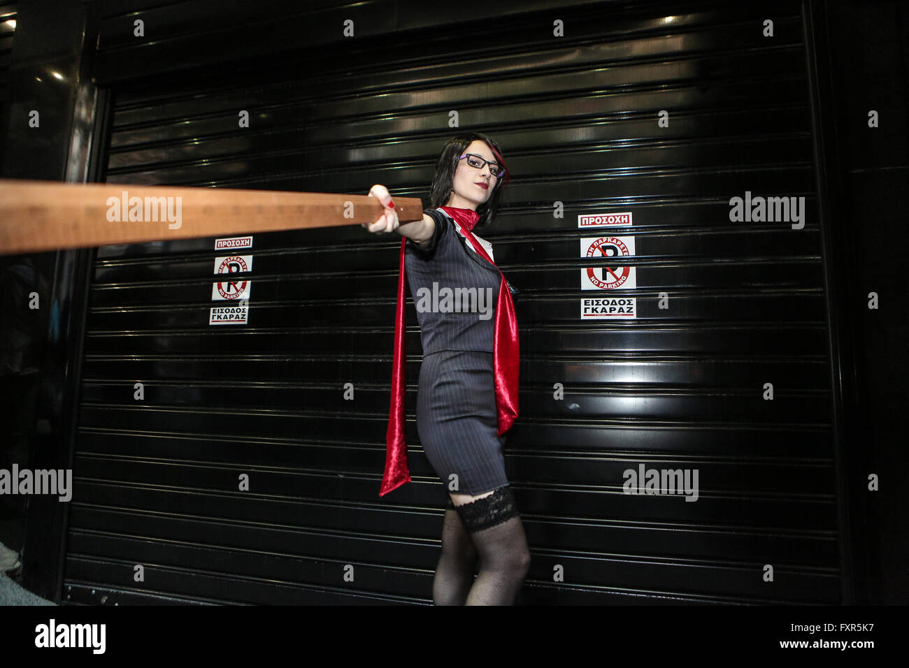 Athens, Greece. 16th Apr, 2015. A girl dressed in a comic hero costume ...