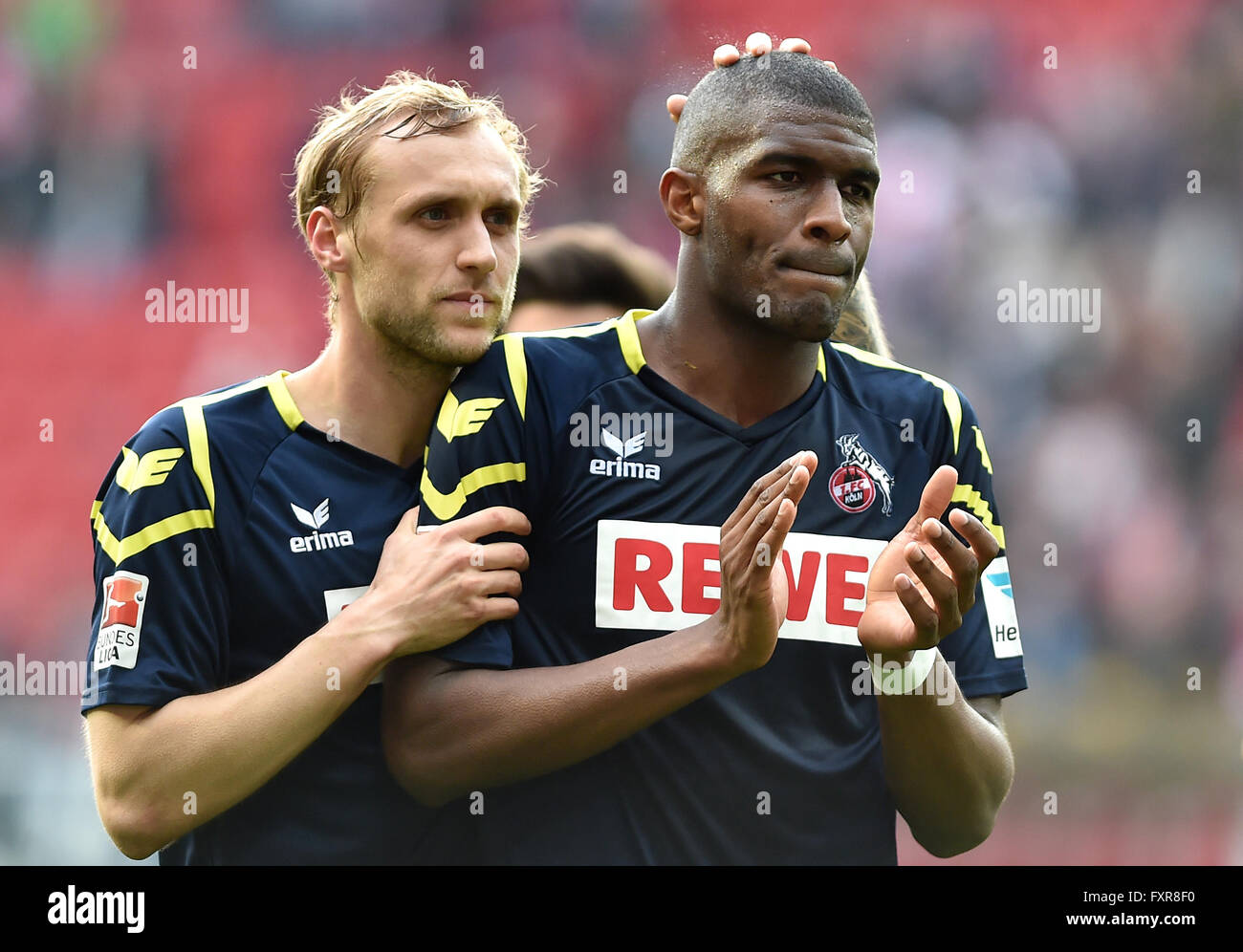 Cologne's Marcel Risse (L) and Anthony Modeste celebrate their team's ...