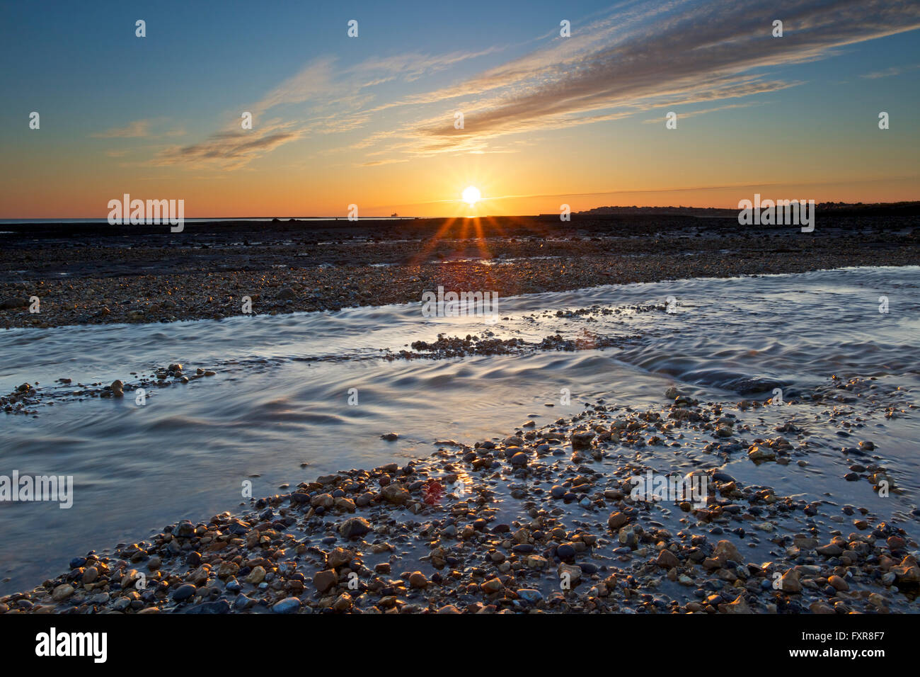 Swalecliffe, Kent, UK. 18th April 2016: UK Weather. A glorious sunrise ...