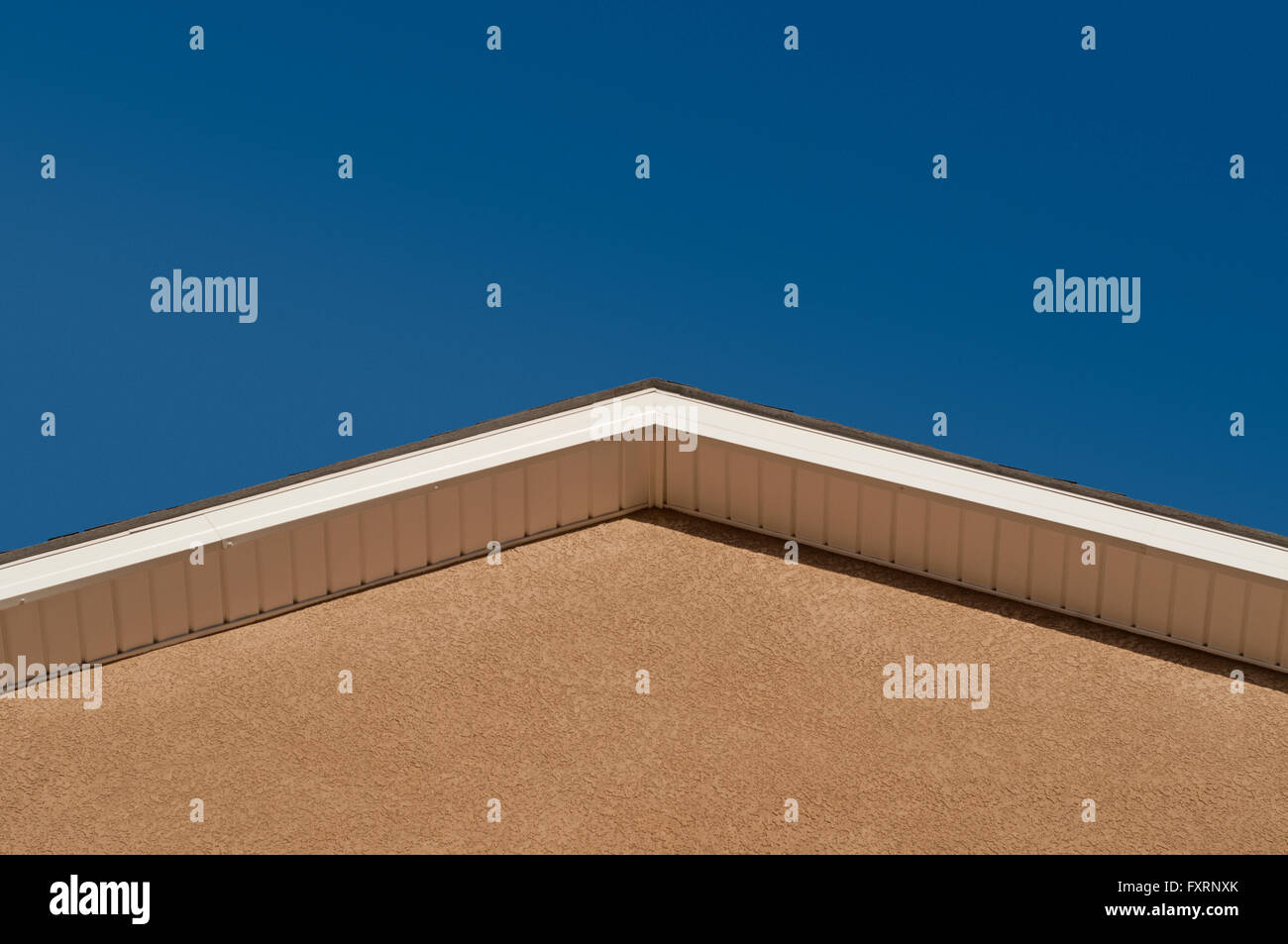 Roof eave stucco sided house hi-res stock photography and images - Alamy