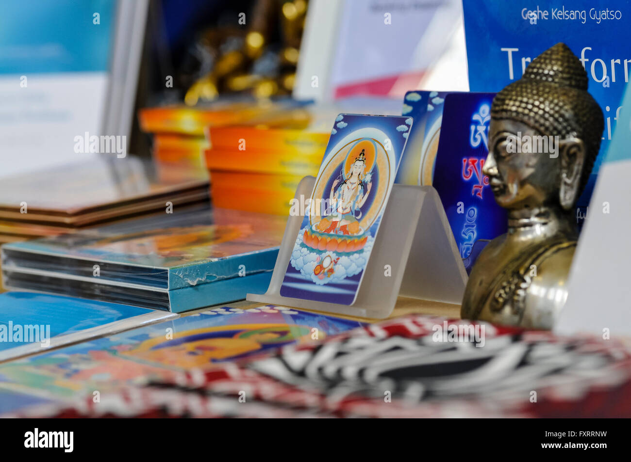 Buddhist books and items on sale at a market stall Stock Photo - Alamy