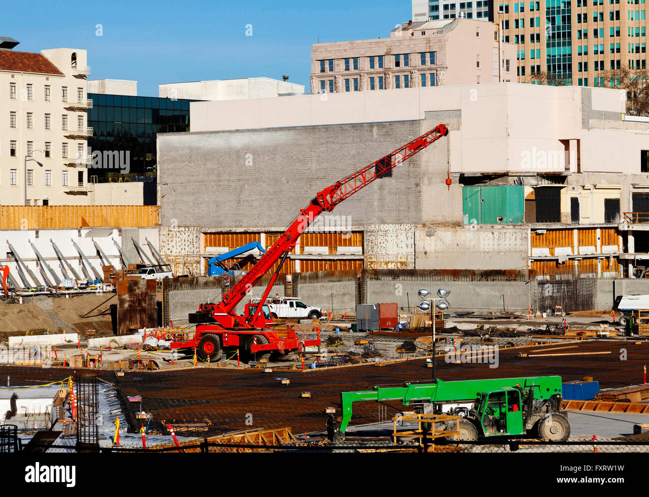 Ground Floor Of Downtown Construction Site With Cranes Stock Photo - Alamy