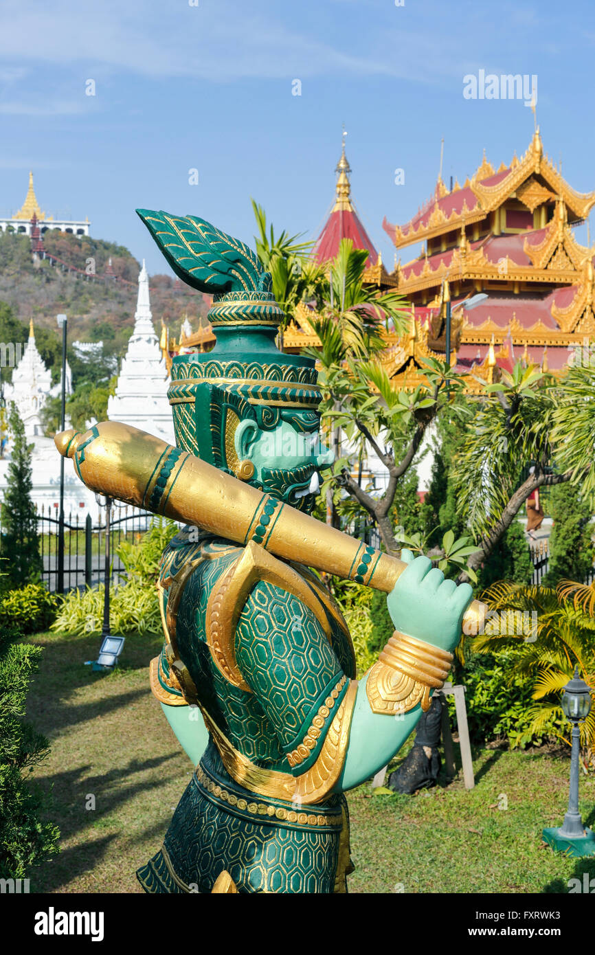 Green Buddhist demon guardian statue, Kyauk Taw Gyi Pagoda at the foot ...