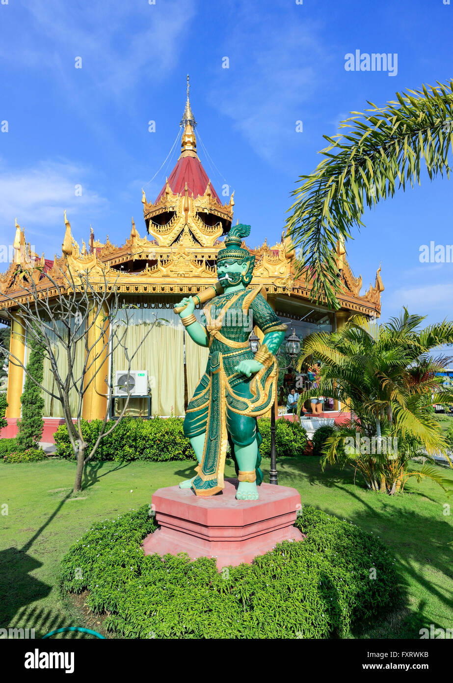 Green Buddhist demon guardian statue, Kyauk Taw Gyi Pagoda at the foot ...