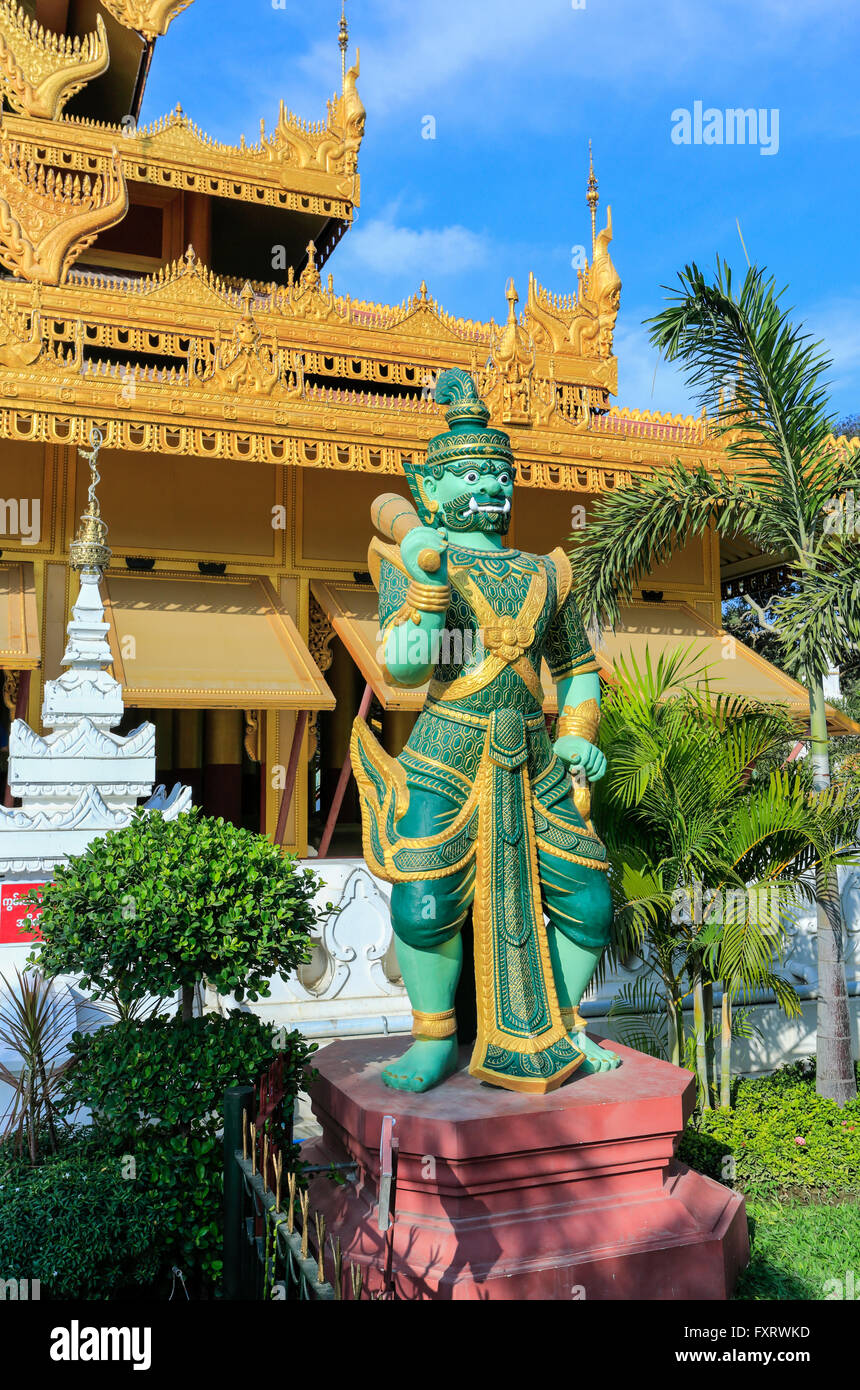 Green Buddhist demon guardian statue, Kyauk Taw Gyi Pagoda at the foot ...