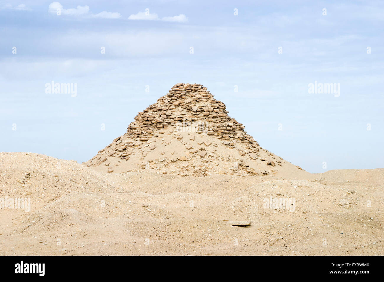 View of a crumbling pyramid in the desert at Sakkara, ancient ...