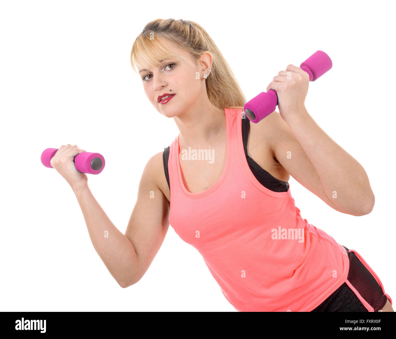 a portrait of pretty sporty girl holding weight Stock Photo - Alamy