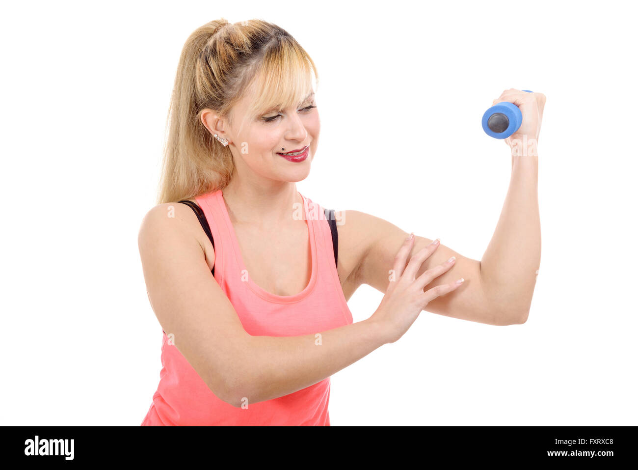a portrait of pretty sporty girl holding weight Stock Photo - Alamy
