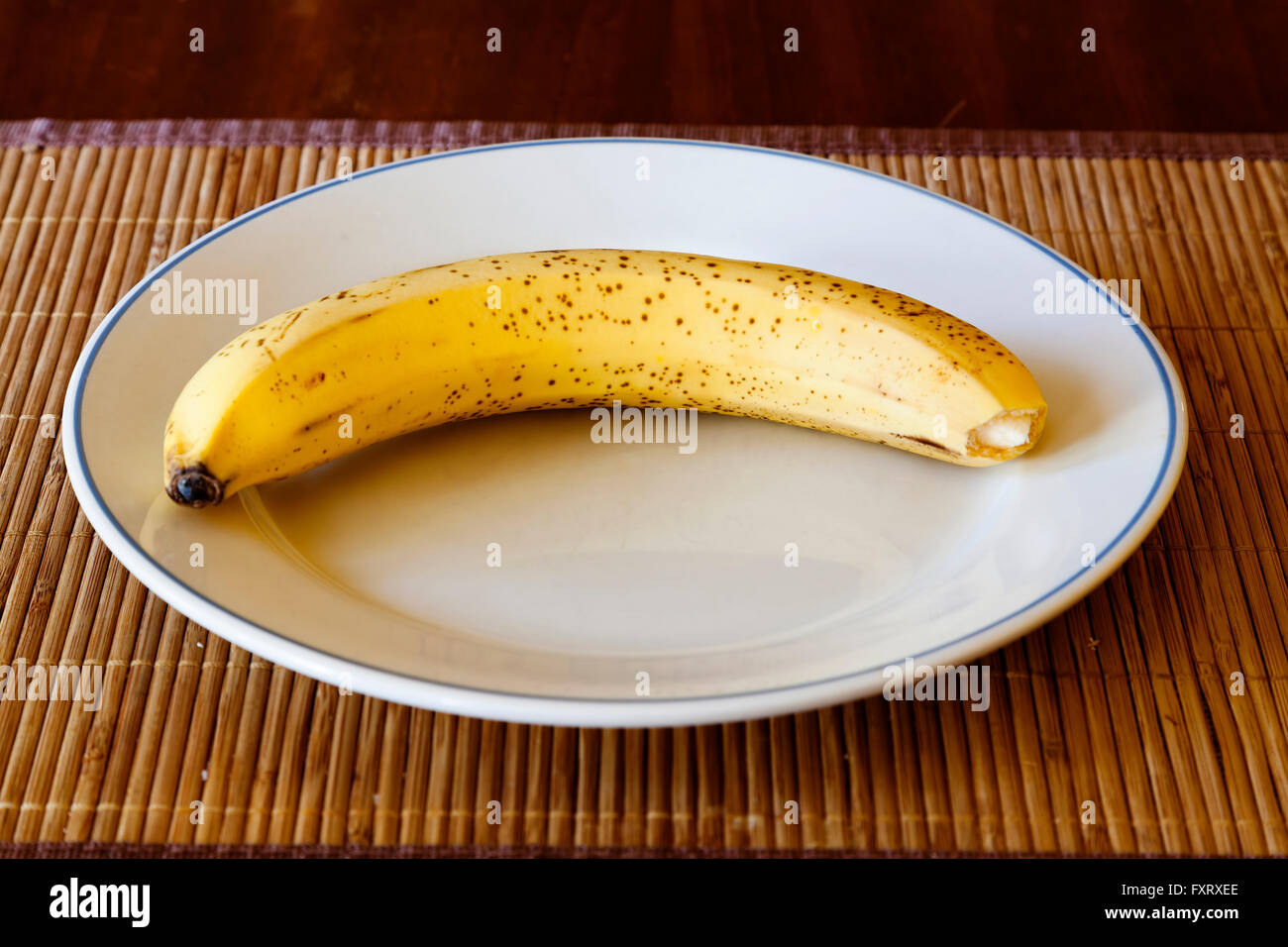 Unpeeled banana hi-res stock photography and images - Alamy