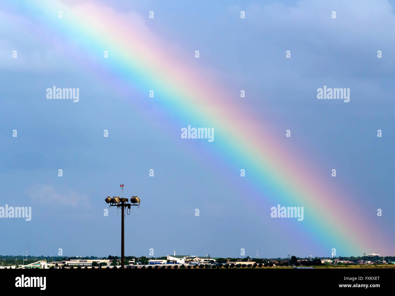 Rainbow In Gray Cloudy Sky Dallas Texas Airport Stock Photo - Alamy