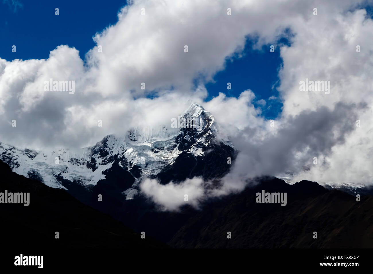 Snow Covered Mount Veronica Peru With White Clouds Stock Photo - Alamy
