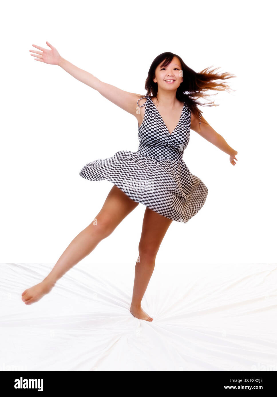 Young Chinese Woman Smiling Spinning In Dress Stock Photo - Alamy