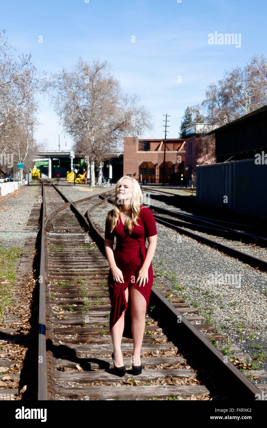 Woman on rail road tracks hi-res stock photography and images - Alamy