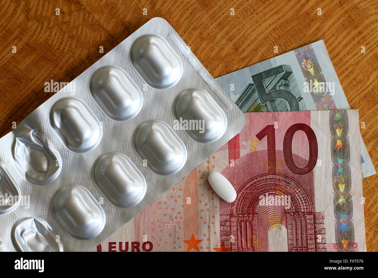 Euro bank notes and tablets hi-res stock photography and images - Alamy