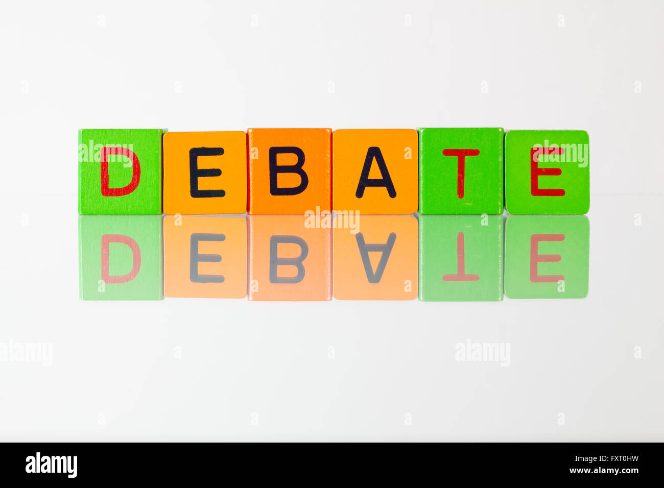 Debate - an inscription from children's wooden blocks Stock Photo - Alamy