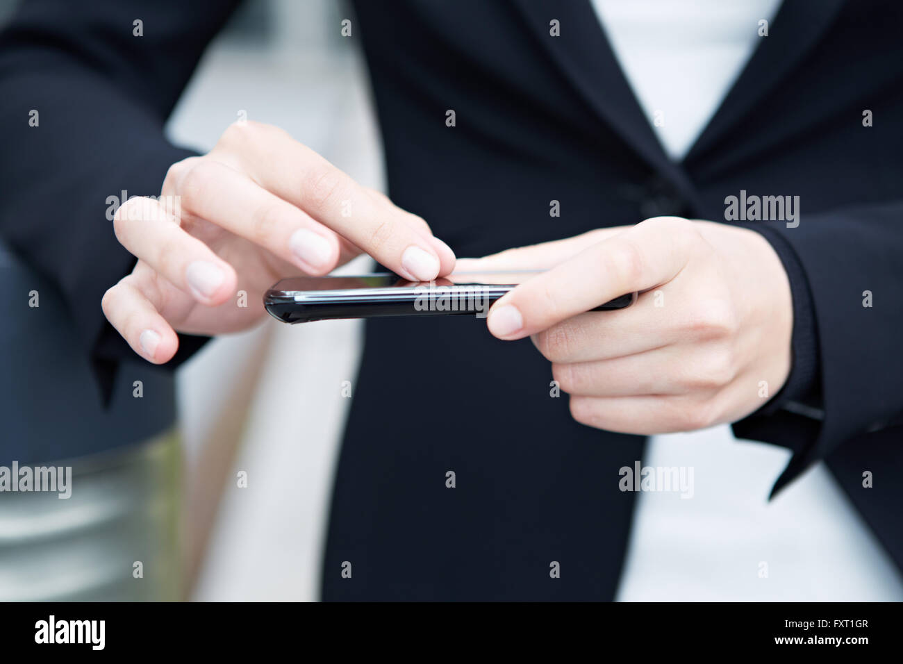Female finger using the touchscreen of a smartphone Stock Photo - Alamy