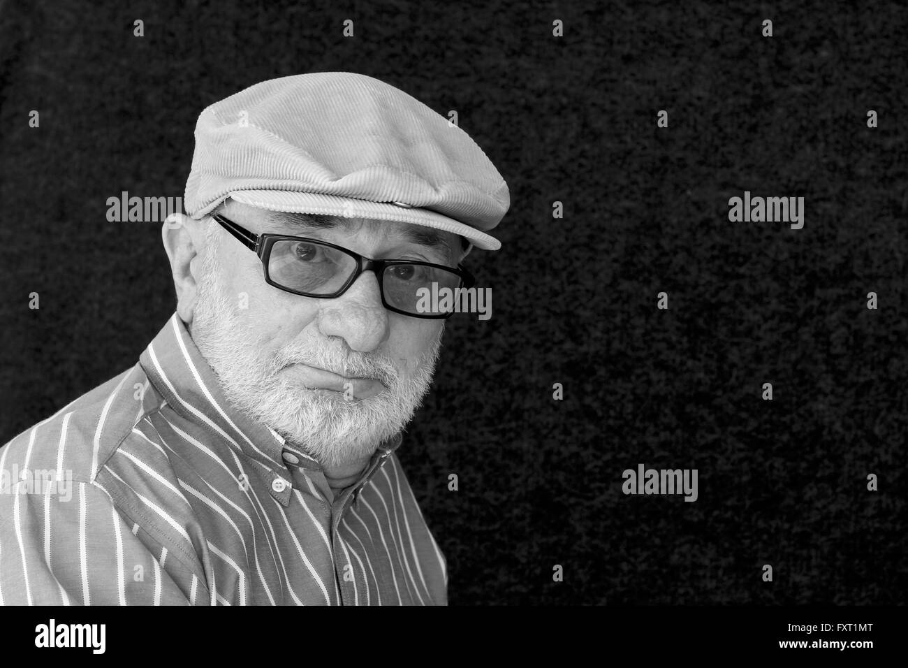 Elderly man with a serious look Black and White Stock Photos & Images ...